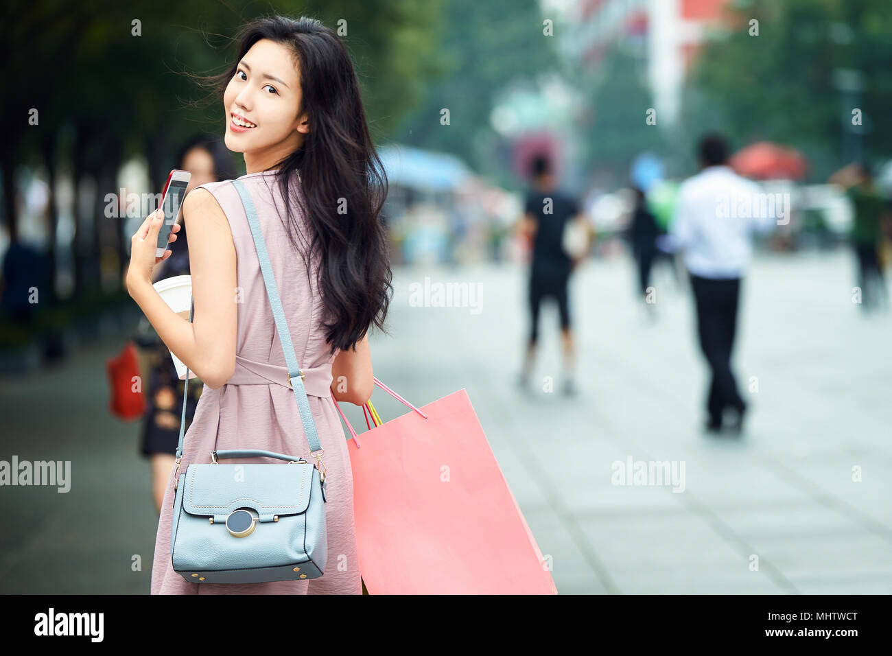 Young women go shopping shopping Stock Photo - Alamy