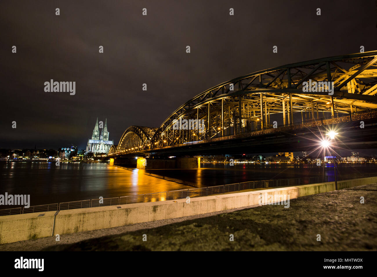 Night view of Hohenzollern Bridge and Cologne Cathedral in Cologne ...