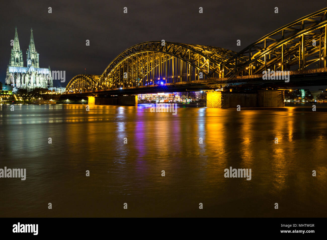 Night view of Hohenzollern Bridge and Cologne Cathedral in Cologne ...