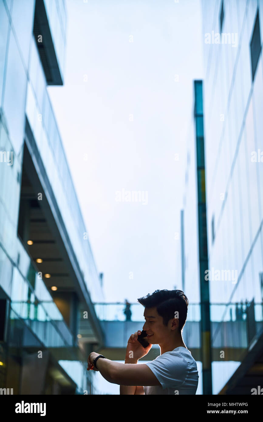 Young man make a phone call Stock Photo - Alamy