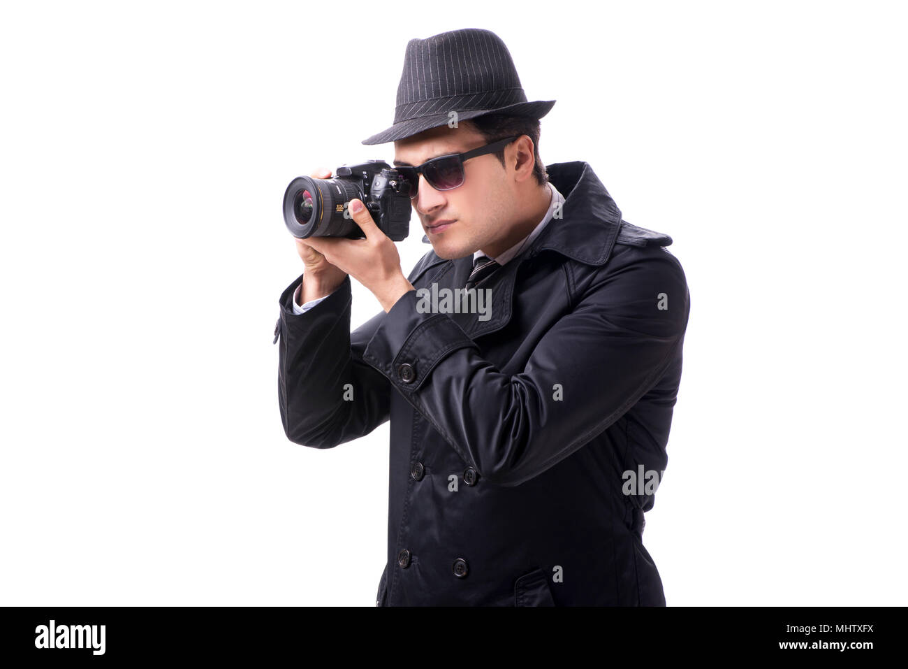 Spy with camera taking pictures isolated on white Stock Photo - Alamy