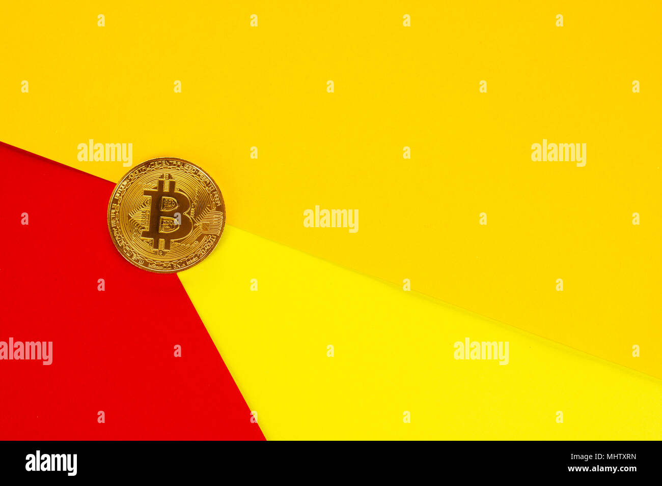 Bitcoin on colorful paper background with copy space Stock Photo - Alamy