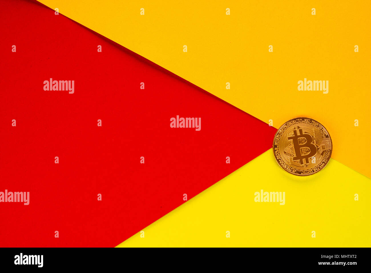 Bitcoin on colorful paper background with copy space Stock Photo - Alamy