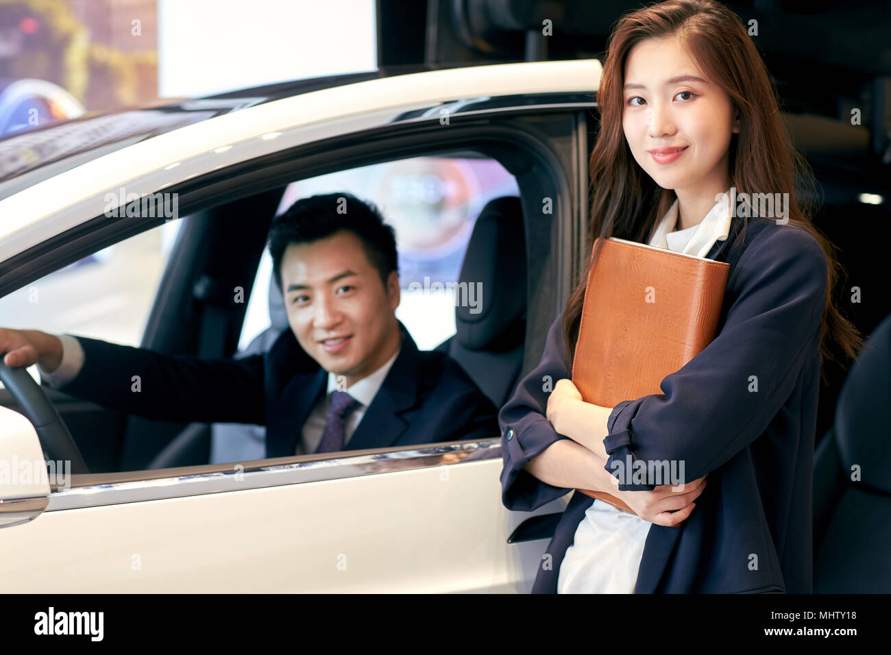 Young men drive cars Stock Photo - Alamy
