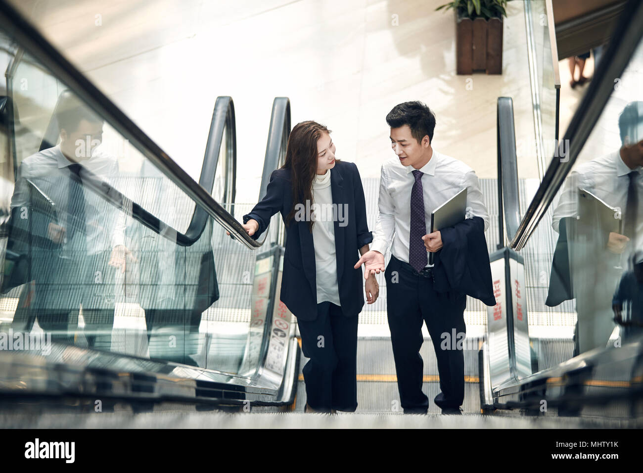 Talk in elevator day hi-res stock photography and images - Alamy