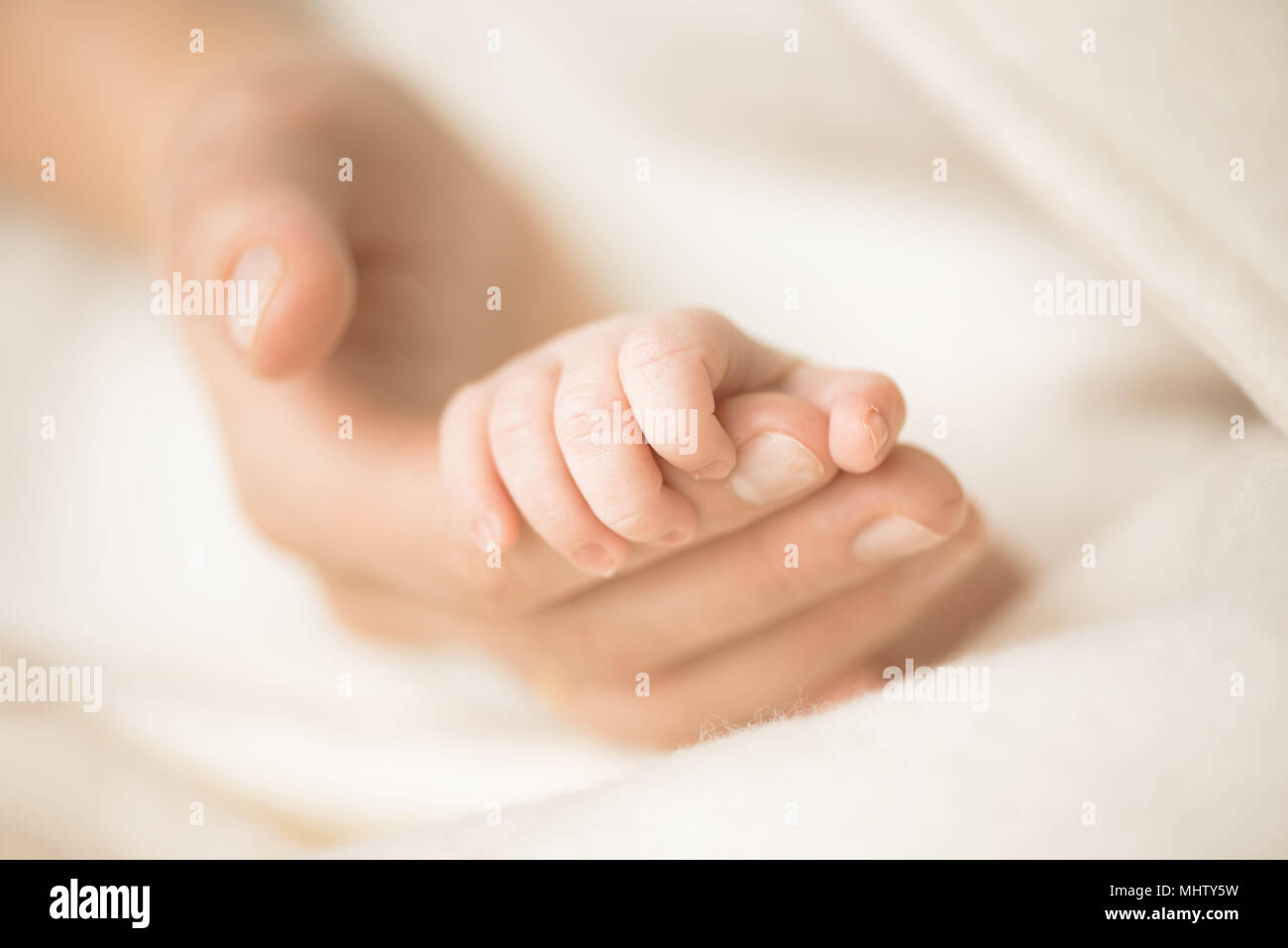 Parent holding child hand hi-res stock photography and images - Alamy