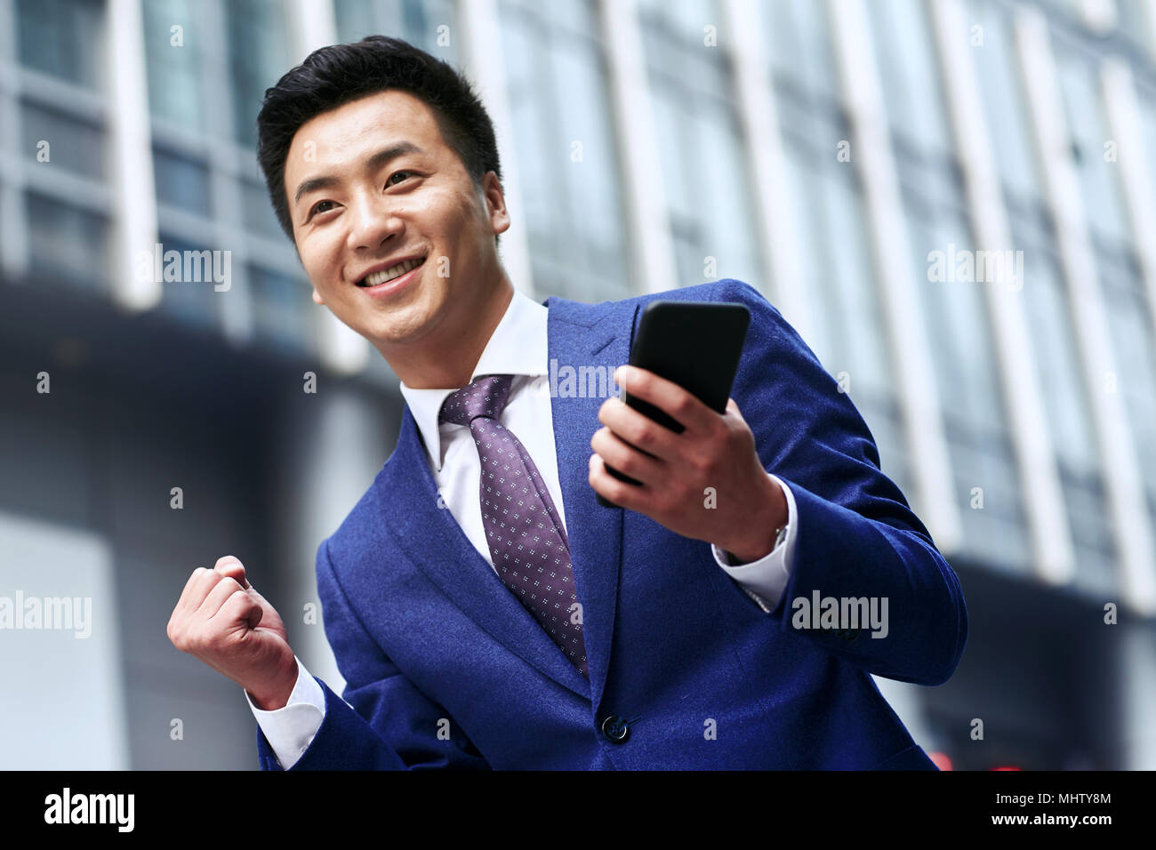 Exciting business man Stock Photo - Alamy