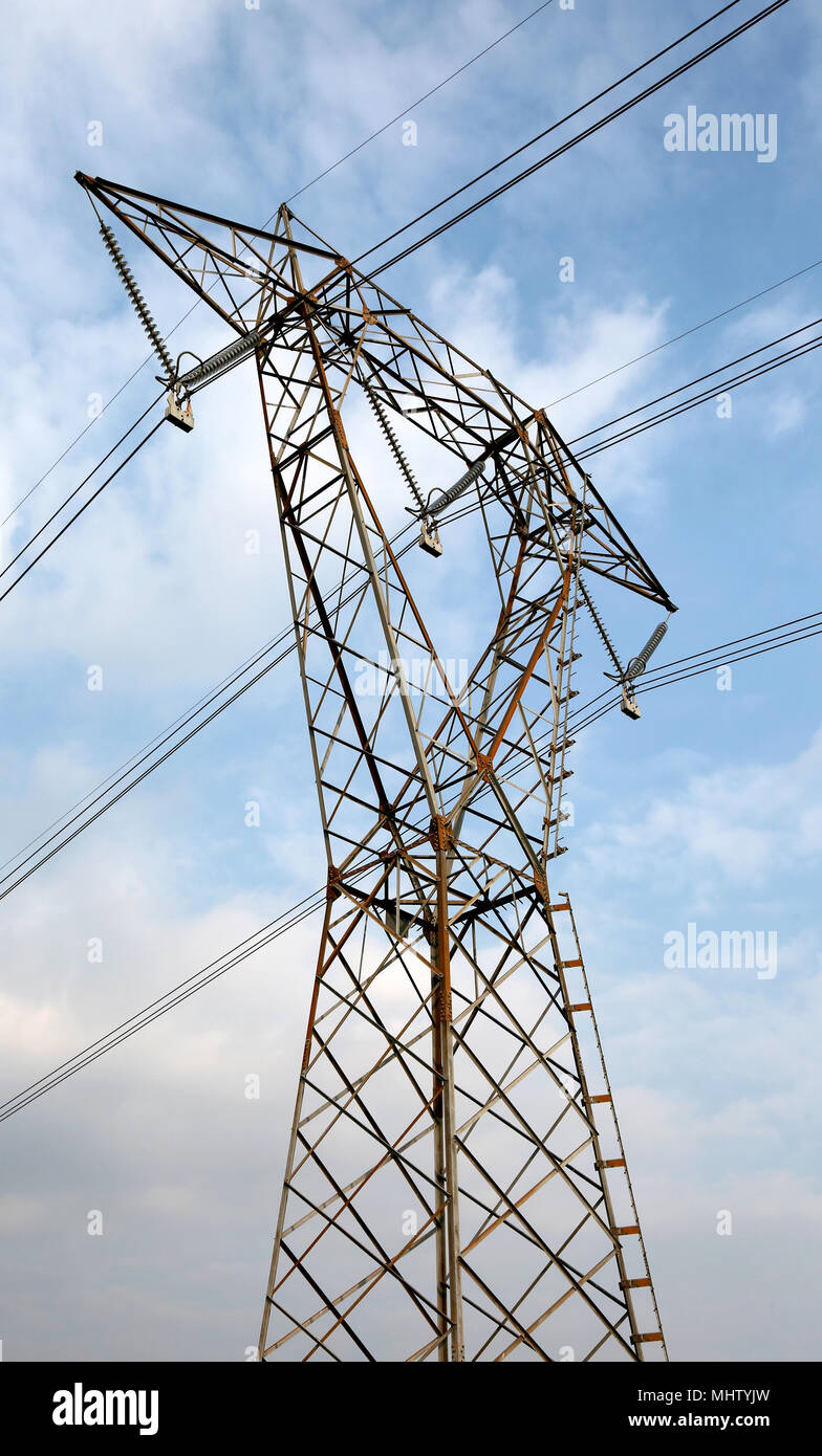 large high voltage metallic pylon with electric cables Stock Photo - Alamy