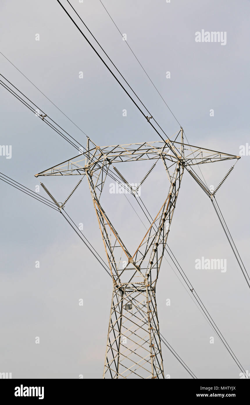 huge high voltage pylon with electric cables Stock Photo - Alamy