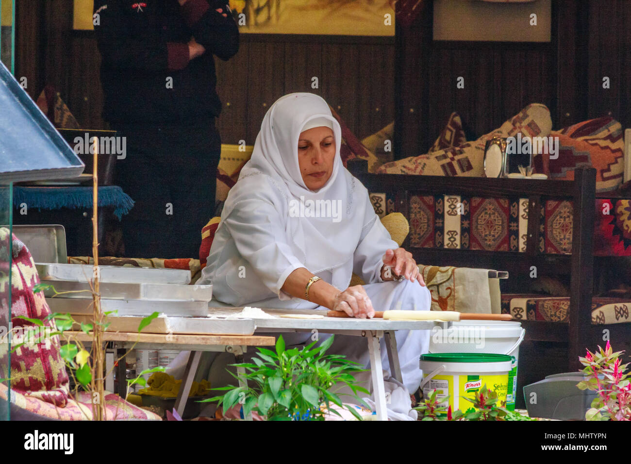 istanbul, Turkey-11th October 2011: Woman making bread, Turkish bread ...