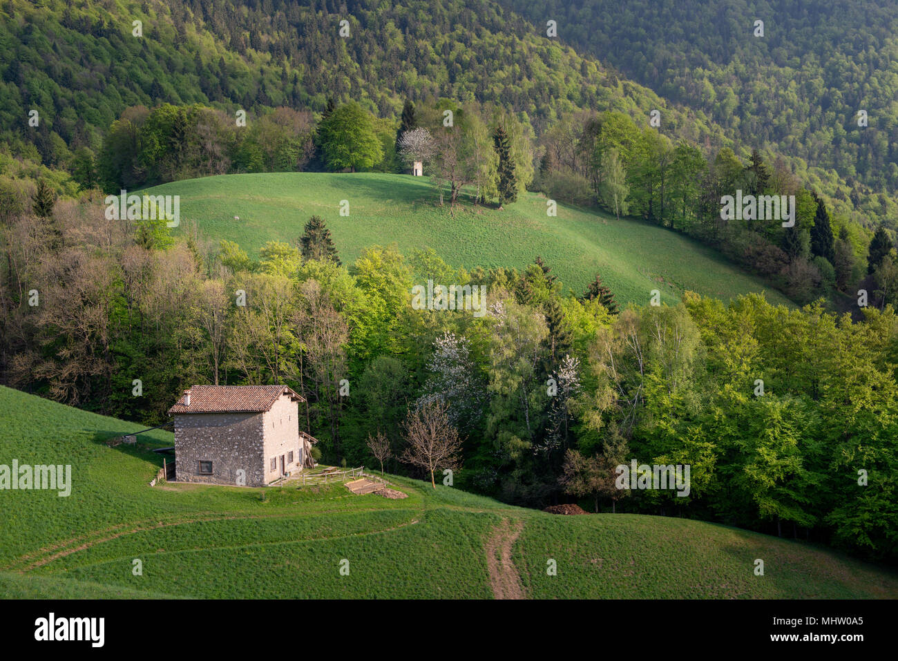 farmhouse in the mountains in spring Stock Photo - Alamy