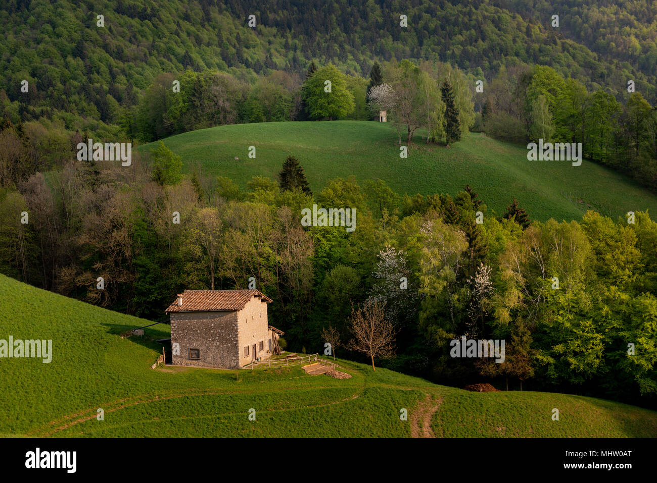farmhouse in the mountains in spring Stock Photo - Alamy