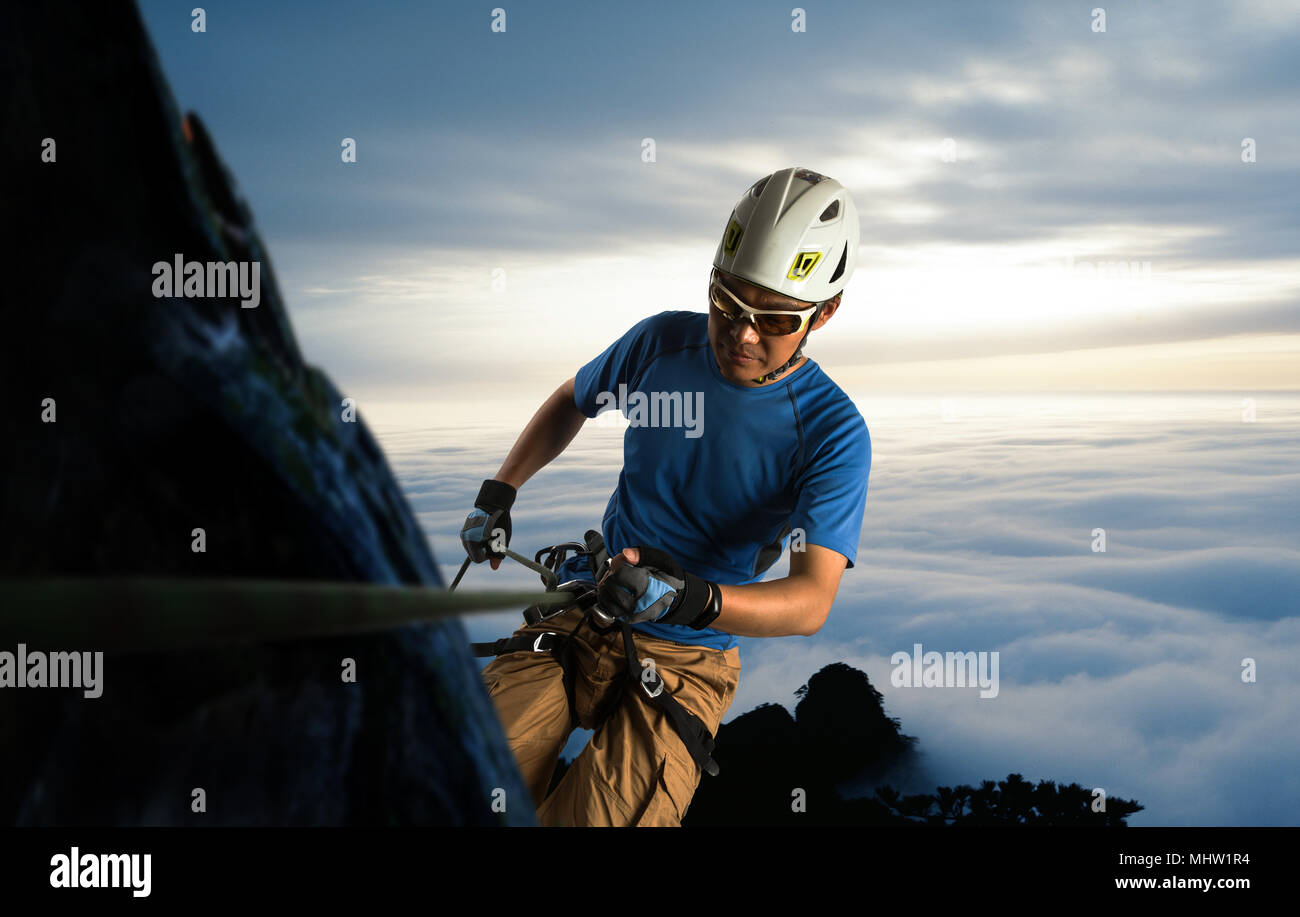 Men climbing mountain balance hi-res stock photography and images - Alamy