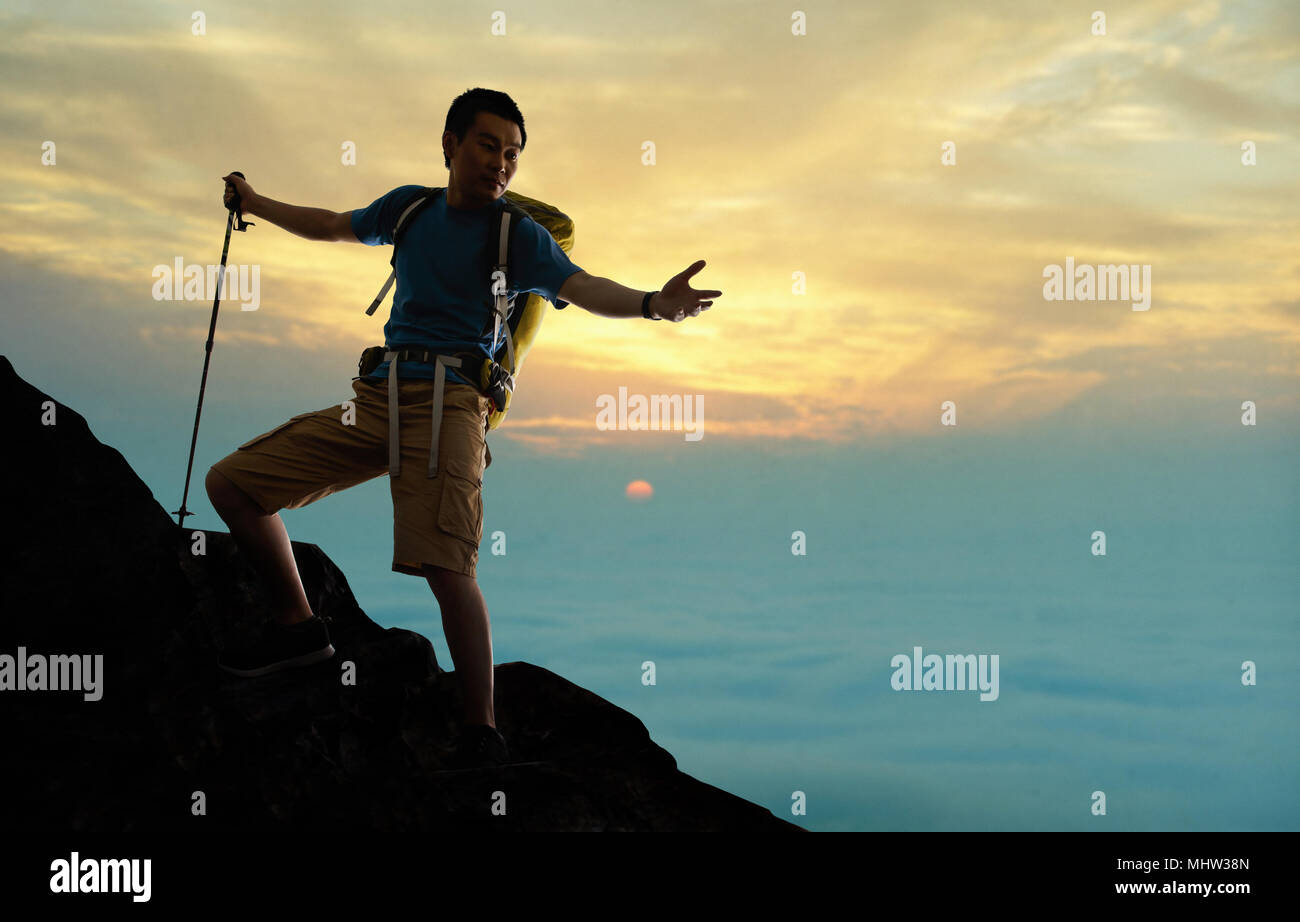 The middle-aged man climbing Stock Photo - Alamy