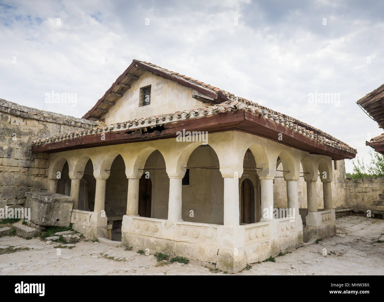 Reconstructed Karaim kenasa in medieval cave town Chufut-Kale Stock ...