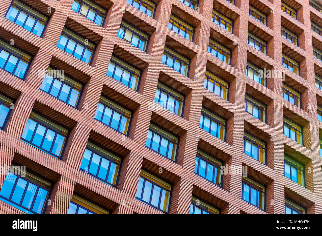 Background of the windows and balconies of the multi-storey building ...