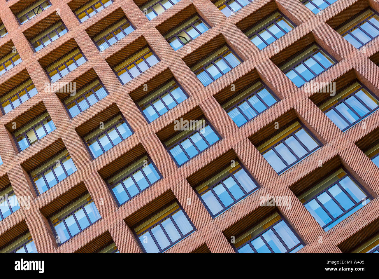 Background of the windows and balconies of the multi-storey building ...