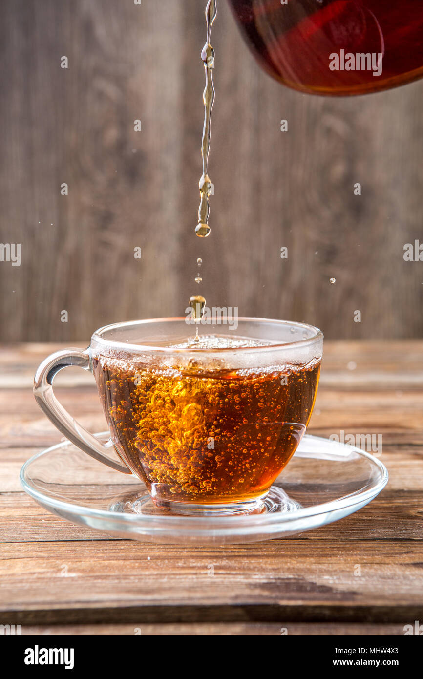 Tea in cup with saucer Stock Photo - Alamy