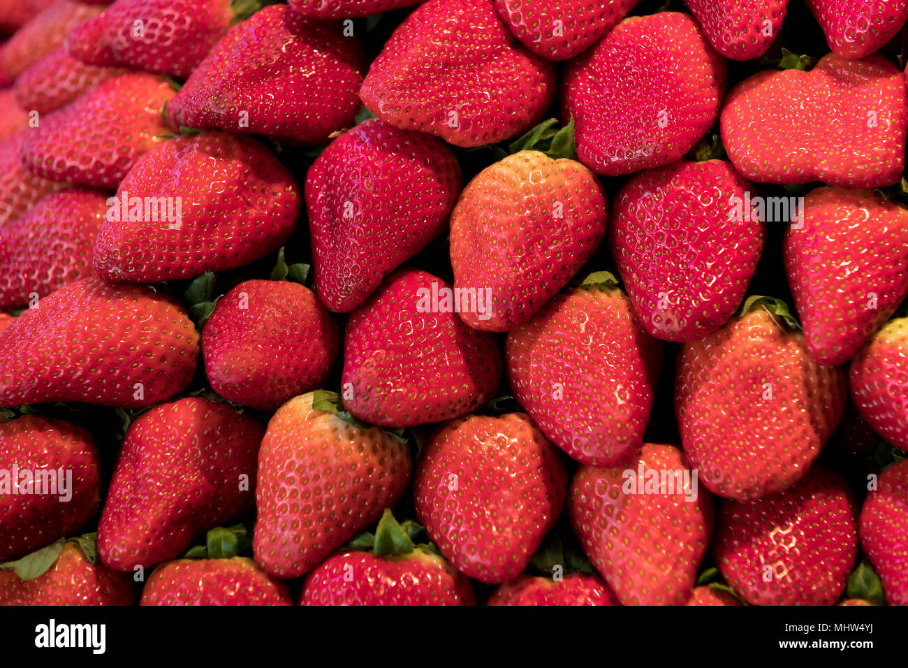 Background of ripe juicy red strawberry close-up Stock Photo - Alamy