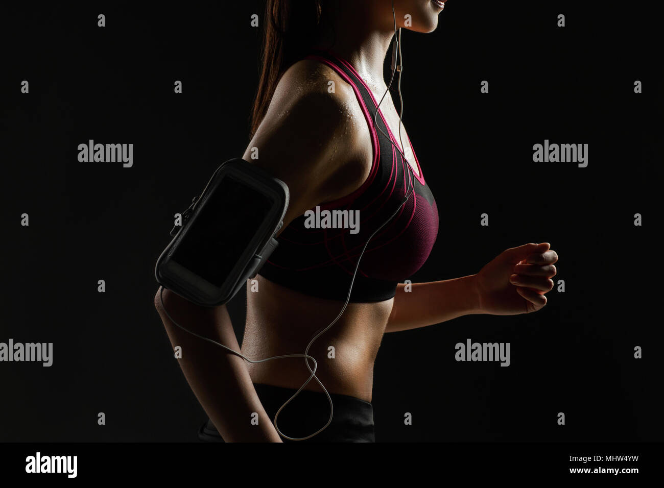 Young woman running Stock Photo - Alamy