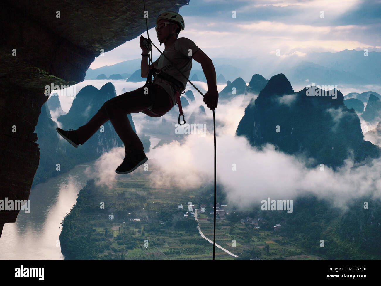 Man climbing river side hi-res stock photography and images - Alamy