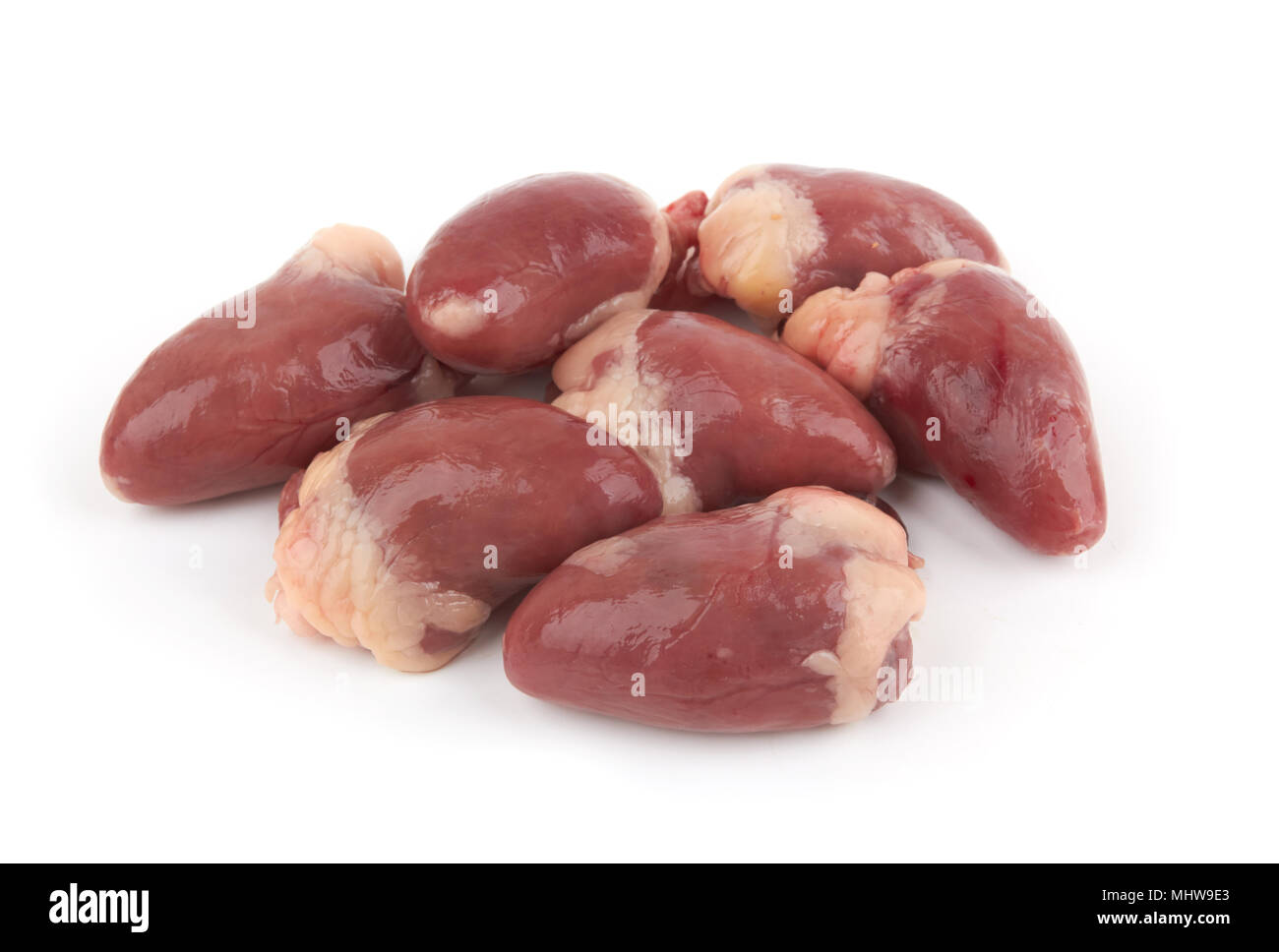 Raw chicken heart isolated on white background Stock Photo - Alamy