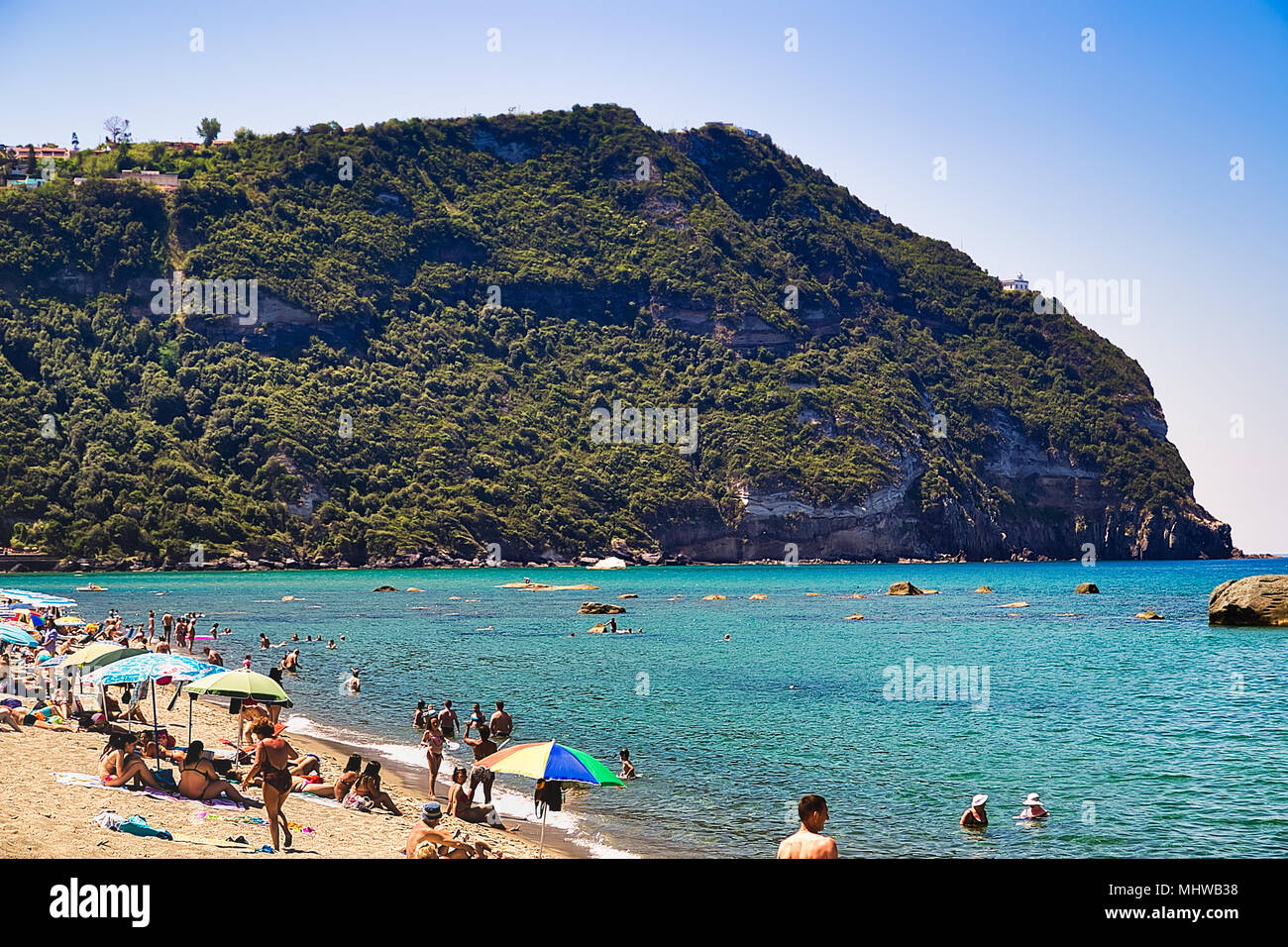 ISCHIA (NA), iTALY - SEPTEMBER 20, 2012: tourists sunbathing on beach ...