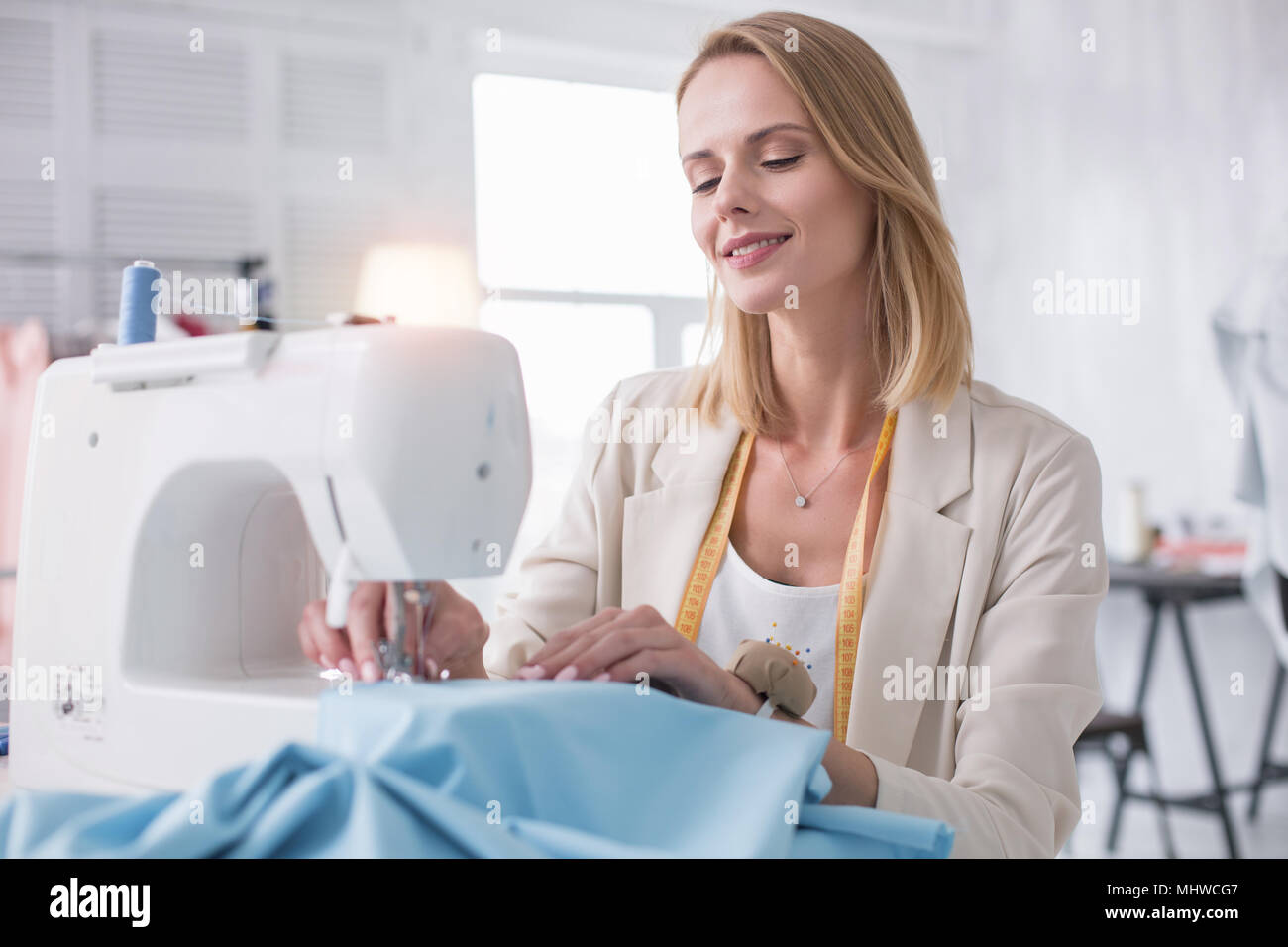Sewing together material hi-res stock photography and images - Alamy