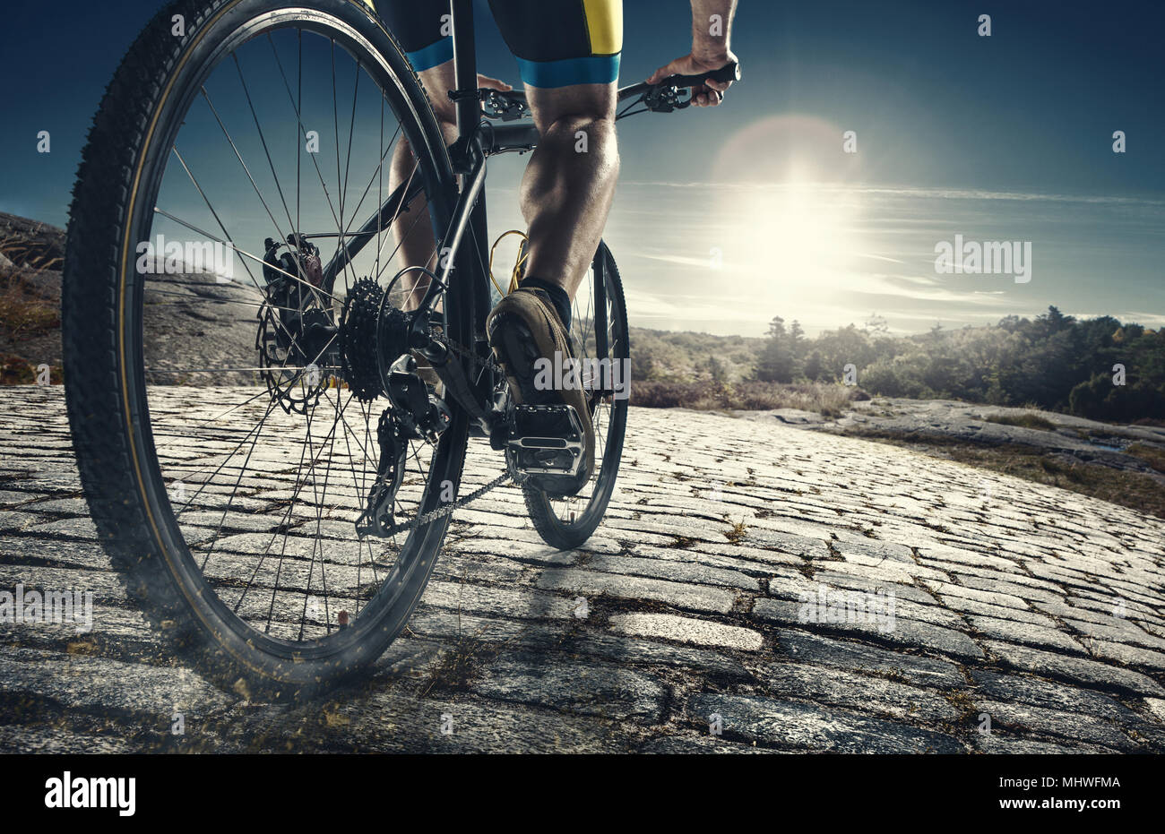 Detail of cyclist man feet riding mountain bike on outdoor trail on ...