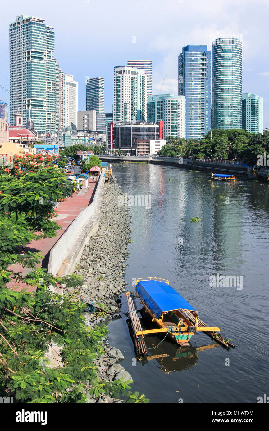 MANILA - JUNE 12: Small passenger ferry boats crossing the pasig river ...