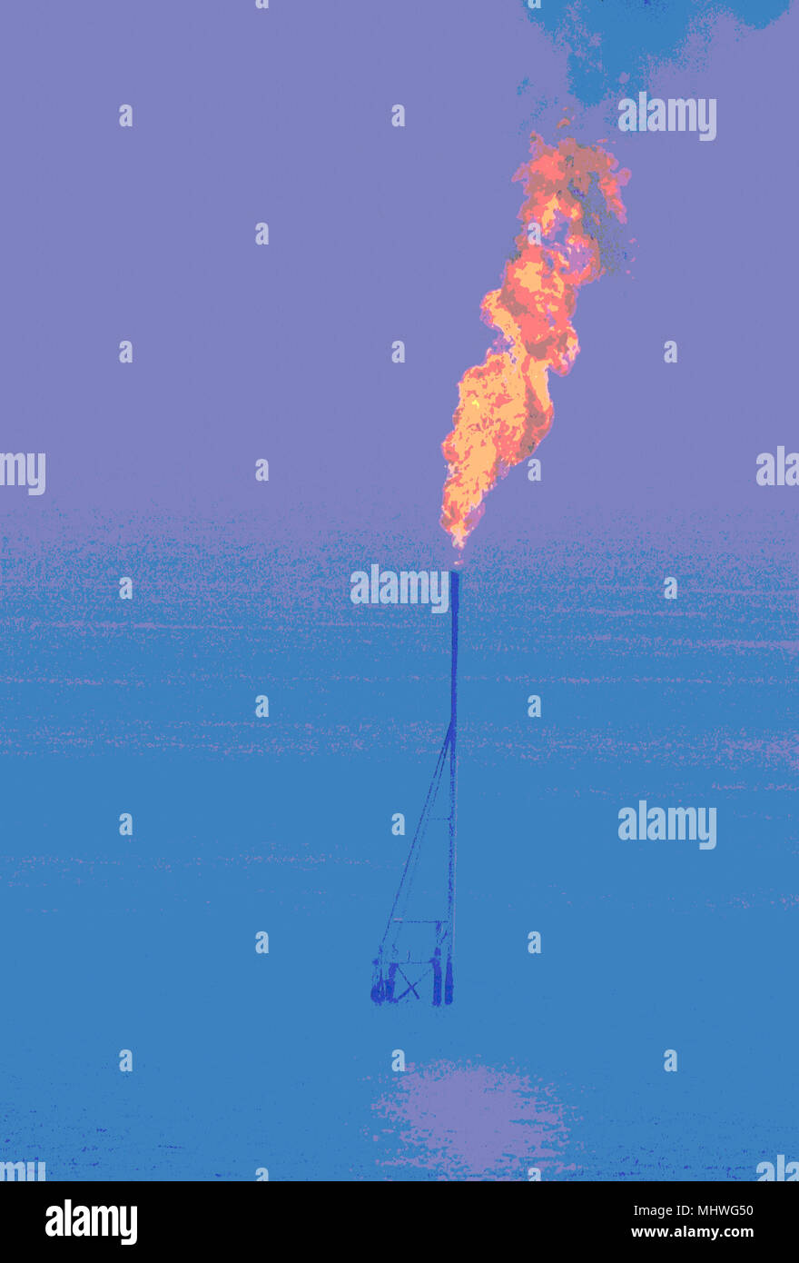 Persian Gulf, off the U.A.E. -- A natural gas flare off the coast of ...