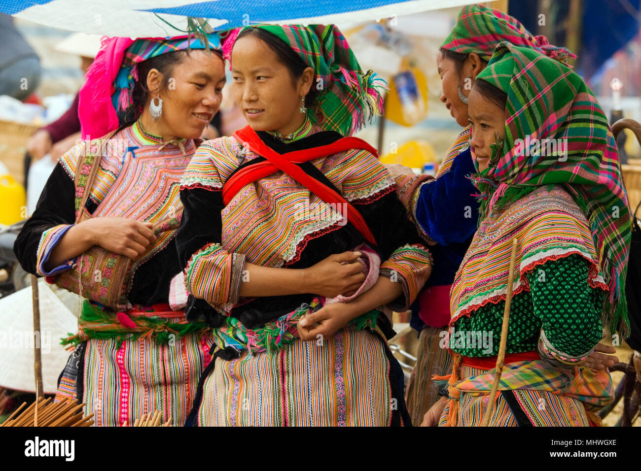 Bac Ha, Vietnam; Flower Hmong women at the Sunday market Stock Photo ...