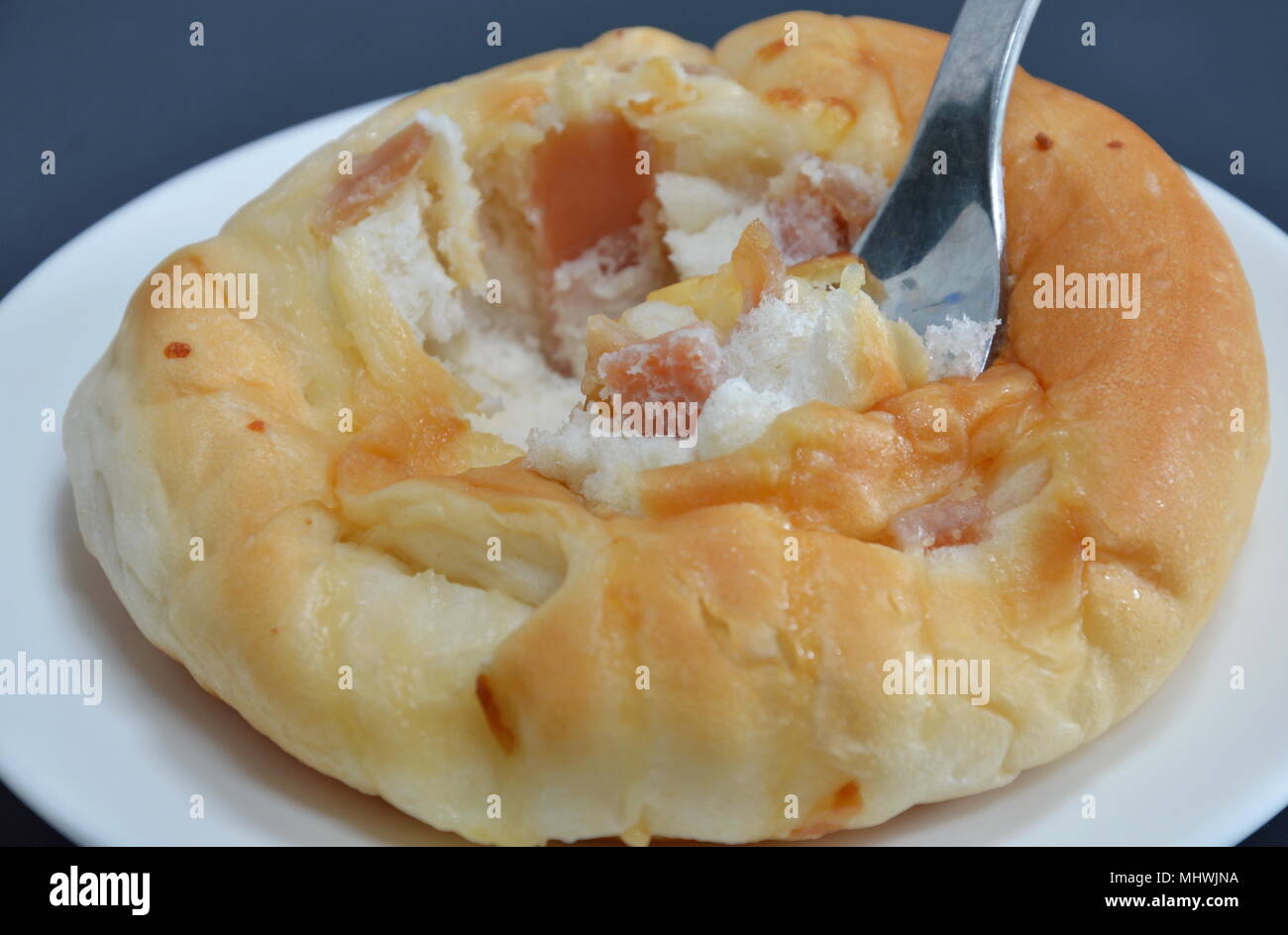 fork on roll bread with chicken ham and cheese Stock Photo - Alamy