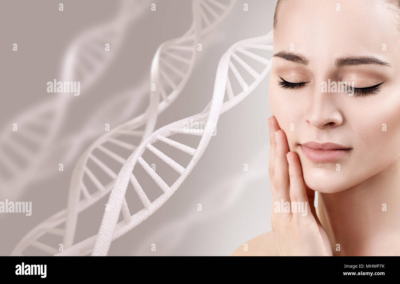 Sensual woman with perfect skin among DNA chains Stock Photo - Alamy