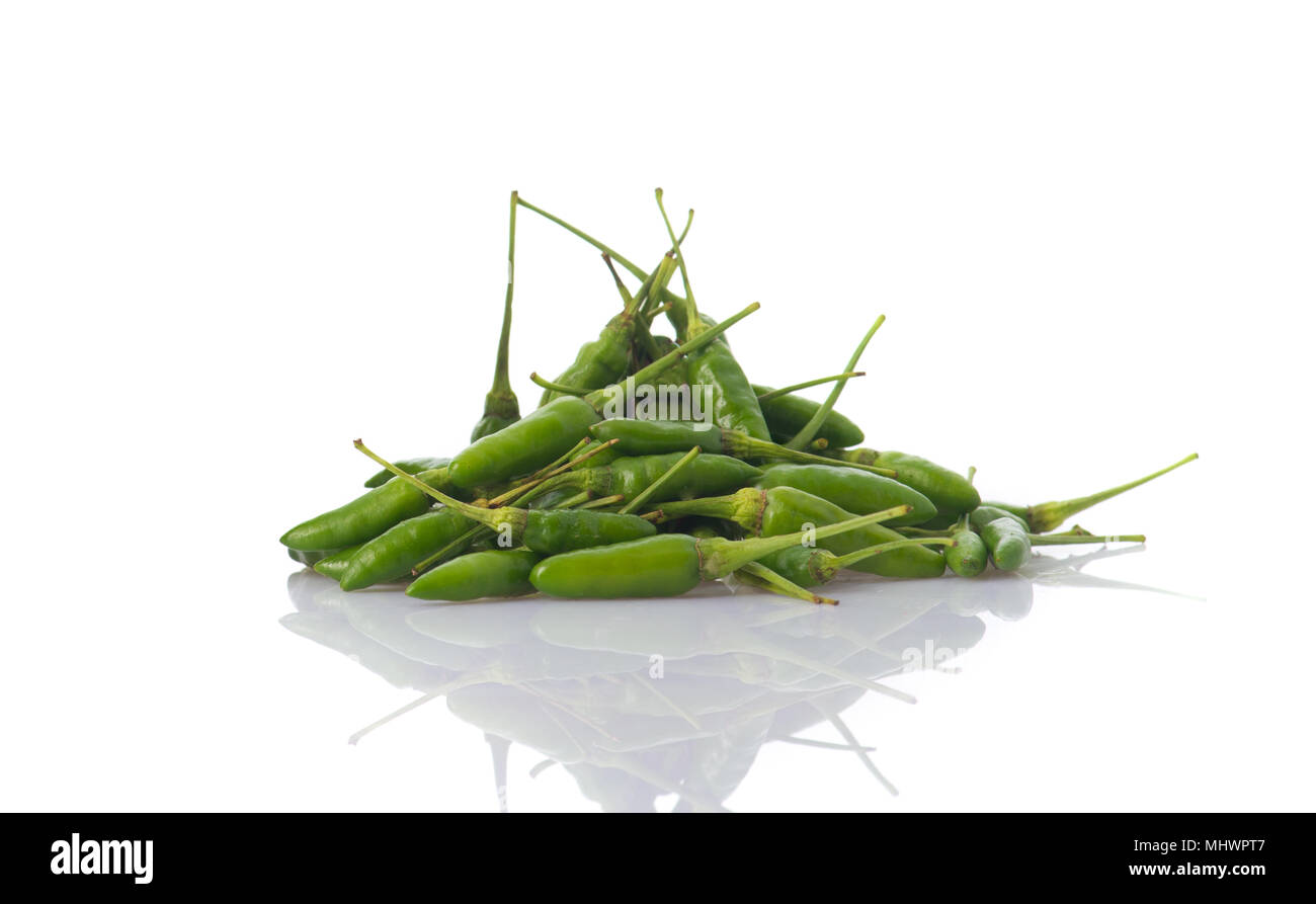 small green chillies isolated on white background Stock Photo - Alamy