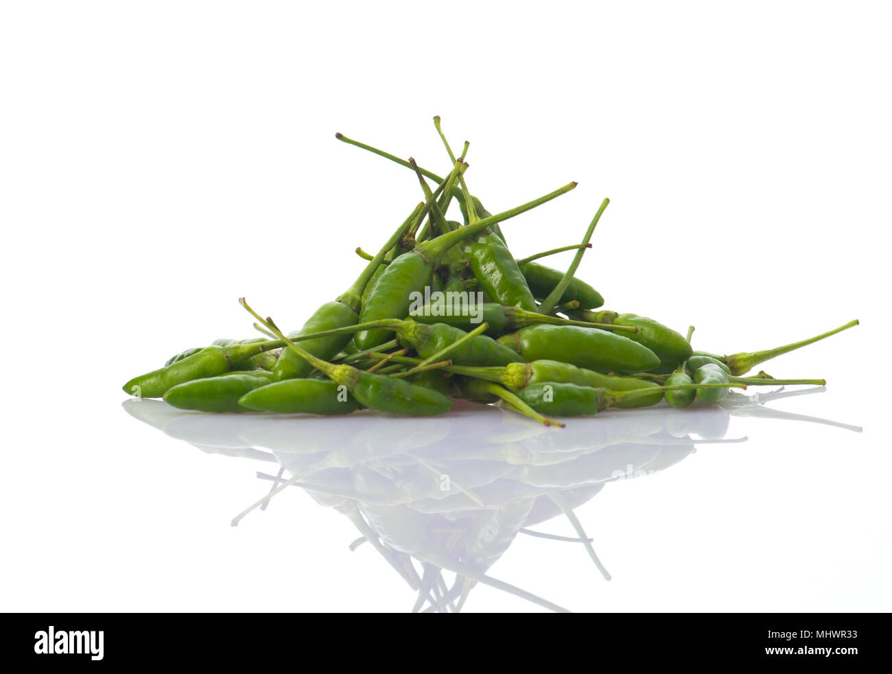 small green chillies isolated on white background Stock Photo - Alamy