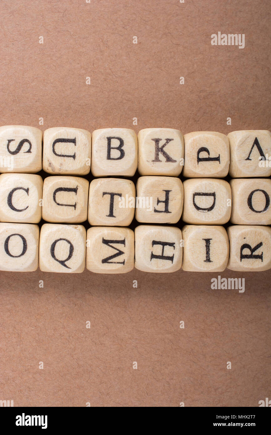 Letter cubes of Alphabet made of wood Stock Photo - Alamy