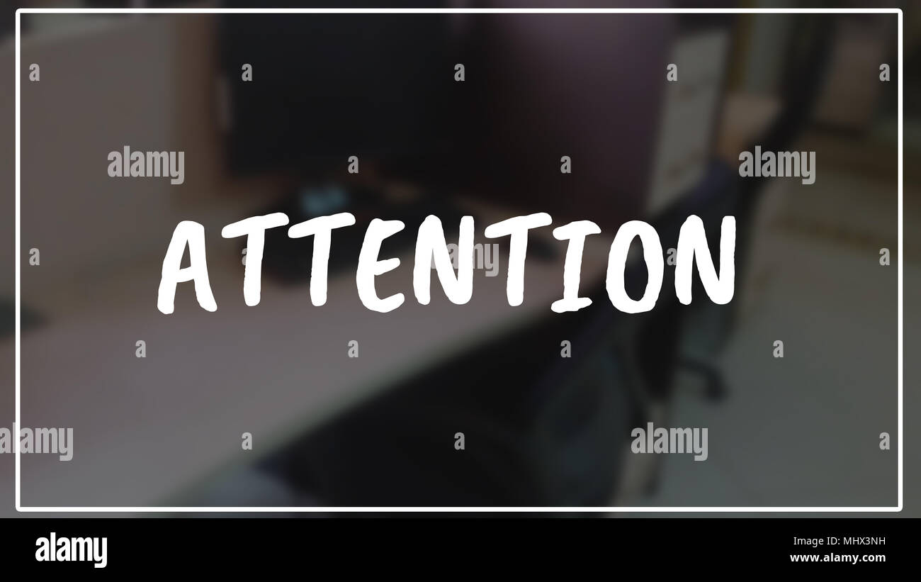 Attention word with business blurring background Stock Photo - Alamy