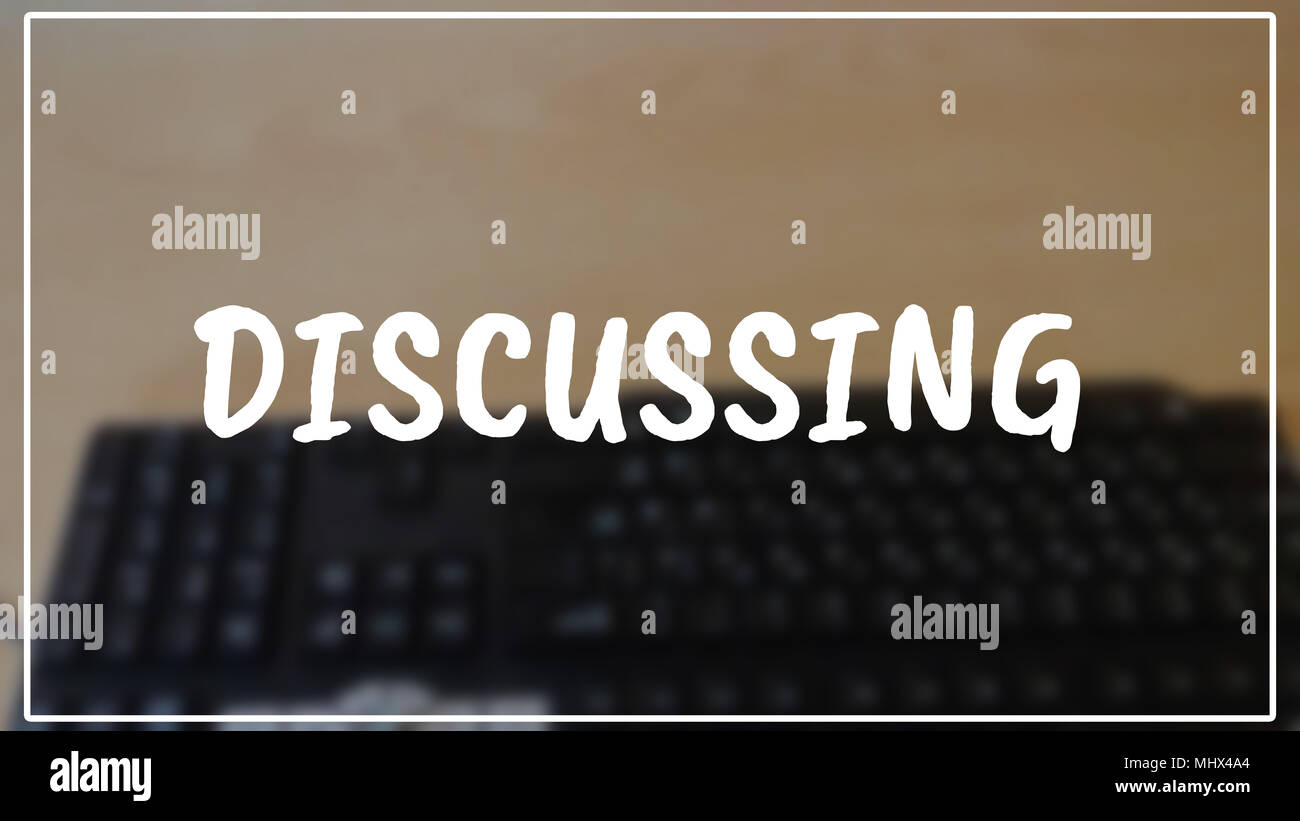 Discussing word with business blurring background Stock Photo - Alamy