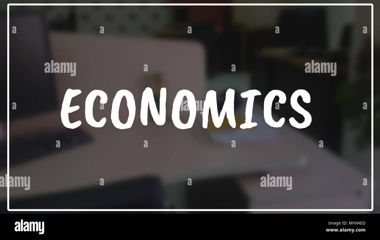 Economics word with business blurring background Stock Photo - Alamy