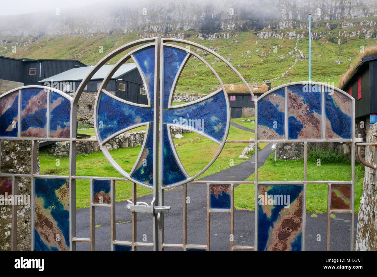 Faer Oer Island view on cloudy background Stock Photo - Alamy