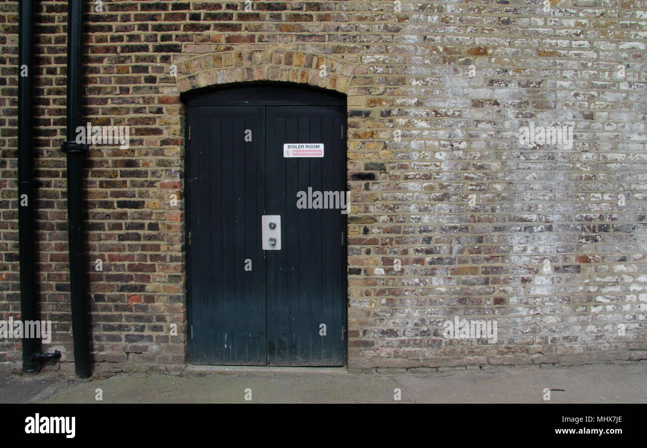 Door on a brickwork brick wall in West London Stock Photo - Alamy