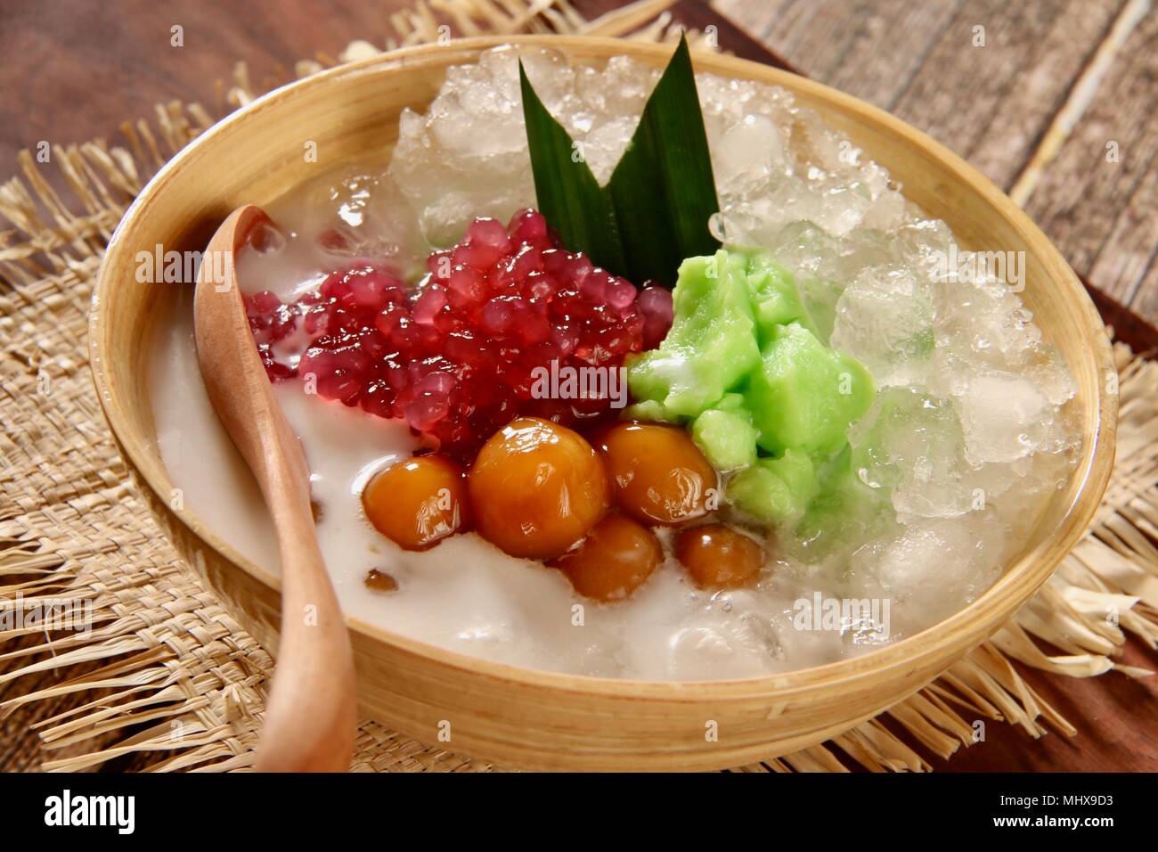 Es Sumsum or Es Loder. Iced dessert drink of pandan rice custard with ...