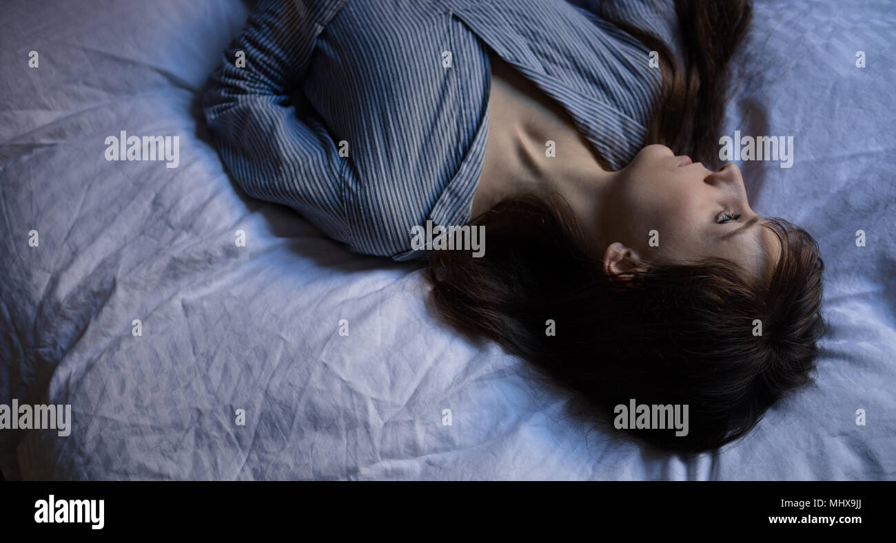 Female lying on mattress hi-res stock photography and images - Alamy