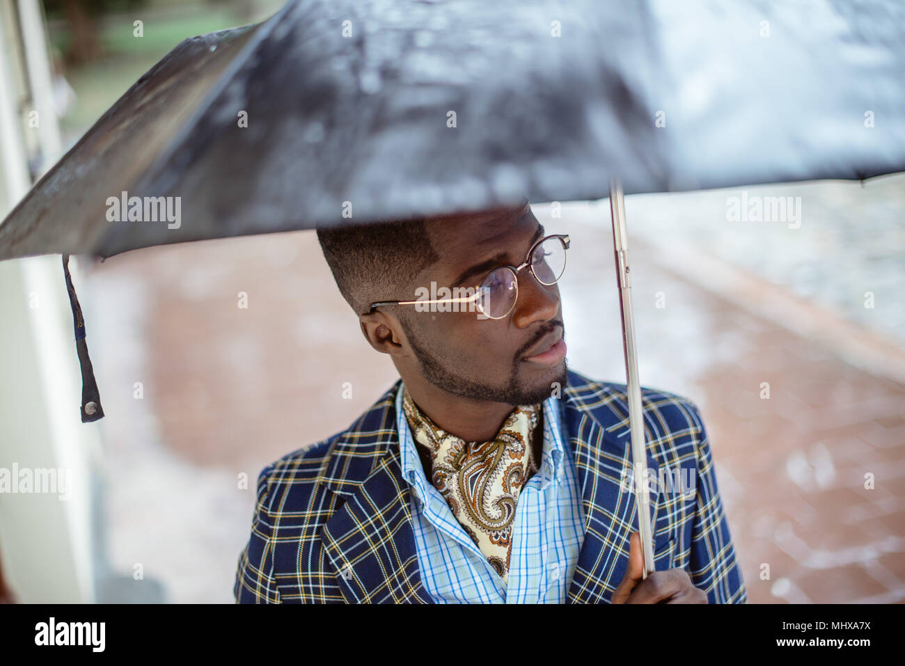 Profile young businessman walking street hi-res stock photography and ...
