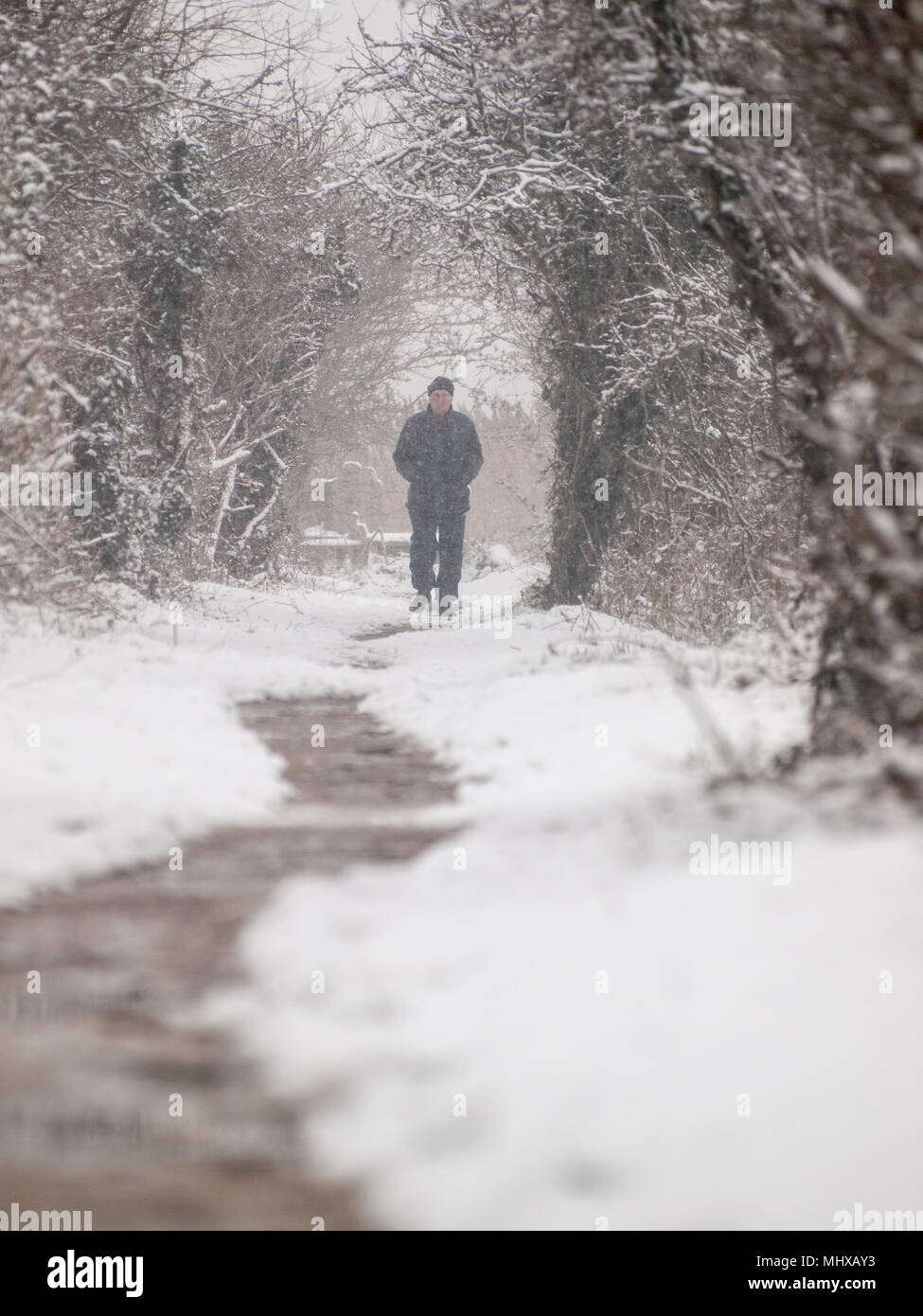 Middle aged man walking alone hi-res stock photography and images - Alamy