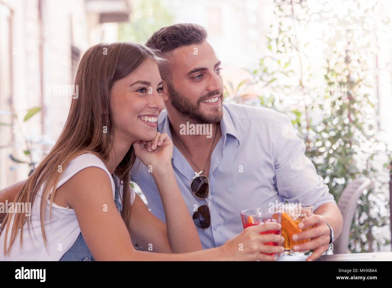 Woman flirting men in bar hi-res stock photography and images - Alamy
