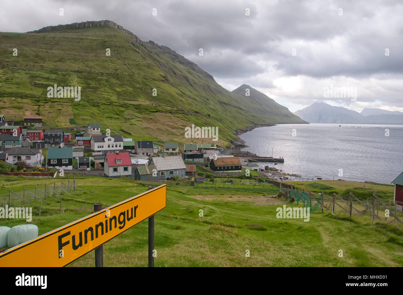 Faer Oer Island view on cloudy background Stock Photo - Alamy