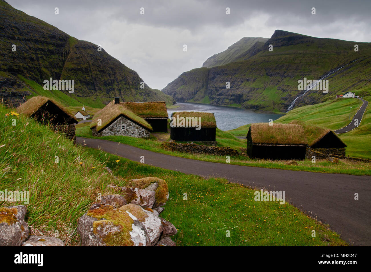 Faer Oer Island view on cloudy background Stock Photo - Alamy