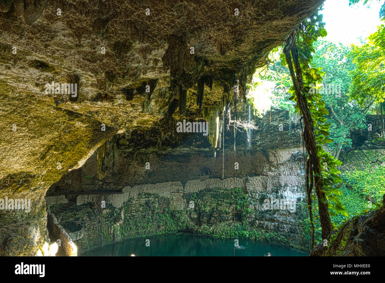 Cenote is a natural sinkhole, resulting from the collapse of limestone ...